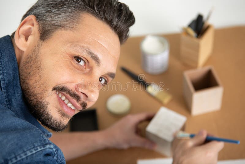 Man painting box stock photo. Image of young, people - 214070804