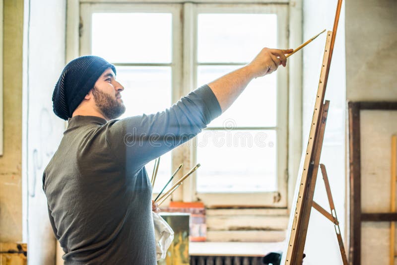 Man Painting with Brush on a Canvas - Landscape Painting Stock Image ...
