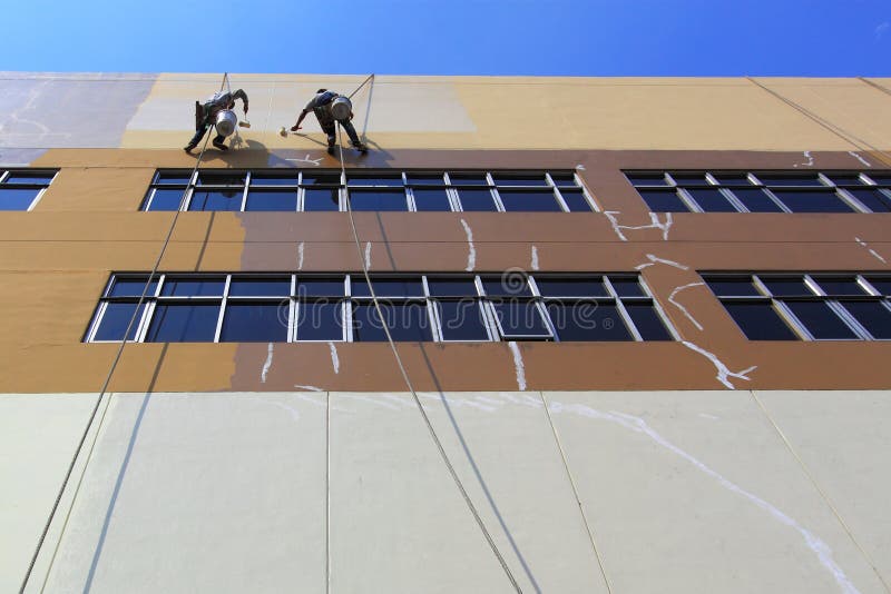 Man painting the building stock photo. Image of caucasian - 18534642