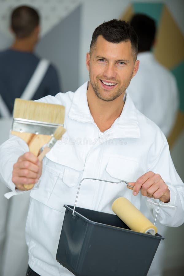 Man painting job stock photo. Image of craftsman, frontal - 283607742