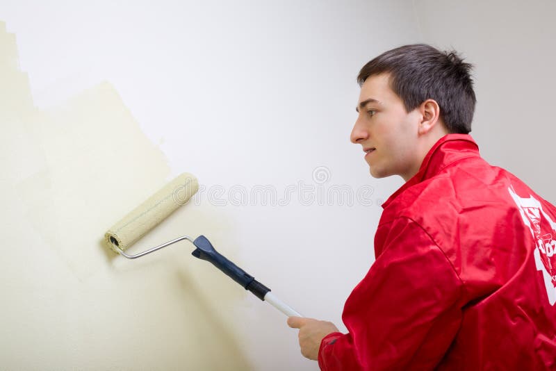 Man painting a wall stock image. Image of color, paint - 4910347