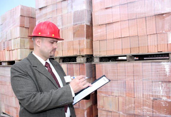 A Man with Pallets of Bricks Stock Image - Image of model, business ...