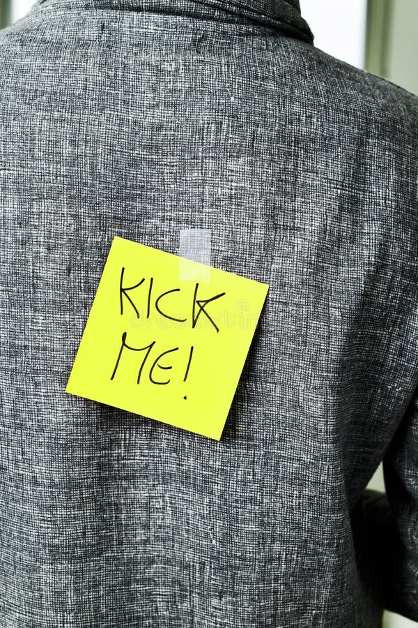 Man with a Paper with the Text Kick Me Attached To His Back Stock Image ...