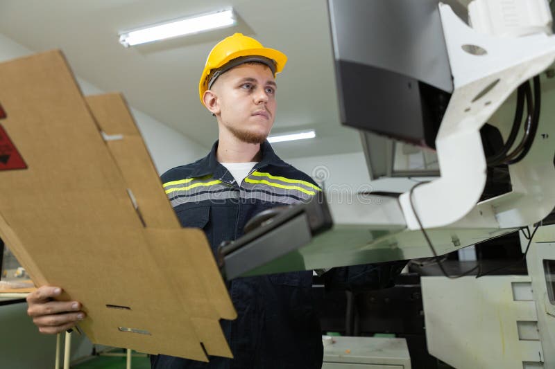 Man Paper Warehouse Worker Check Quality and Quantity Cardboard ...