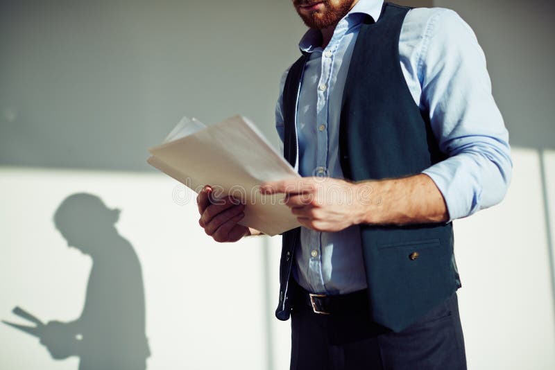 Man with papers stock photo. Image of manager, looking - 55545180