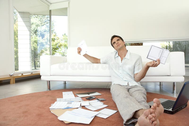 Man with Paperwork Sitting on Floor Stock Image - Image of financial ...