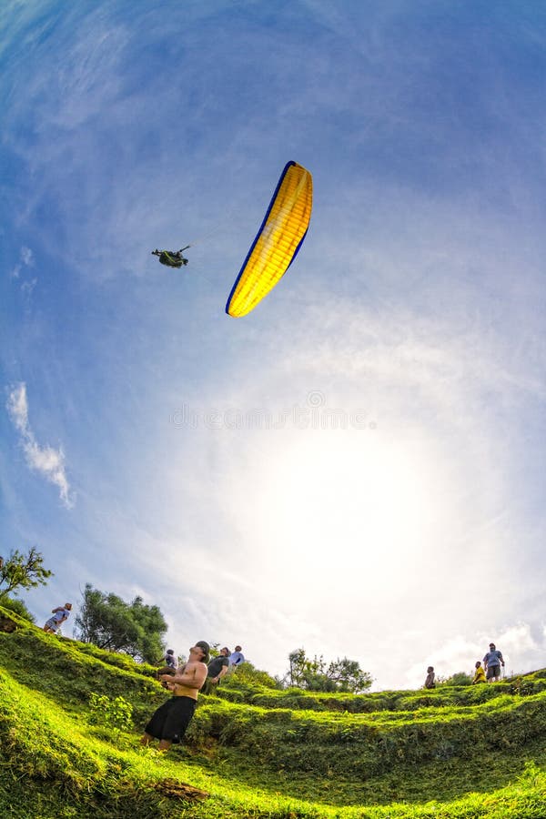 Man paragliding in Bal editorial image. Image of candi - 28525565