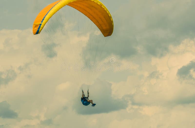 A man paragliding stock photo. Image of clouds, active - 121534094