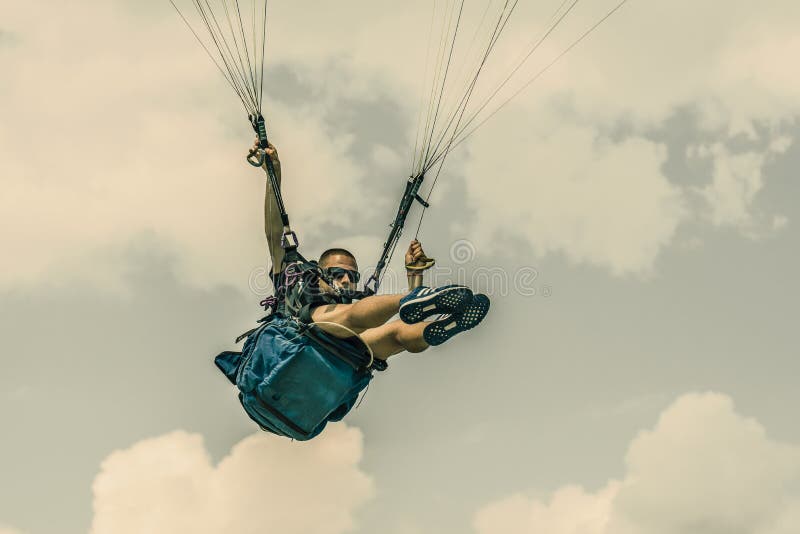 A man paragliding stock image. Image of parachute, freedom - 121534175