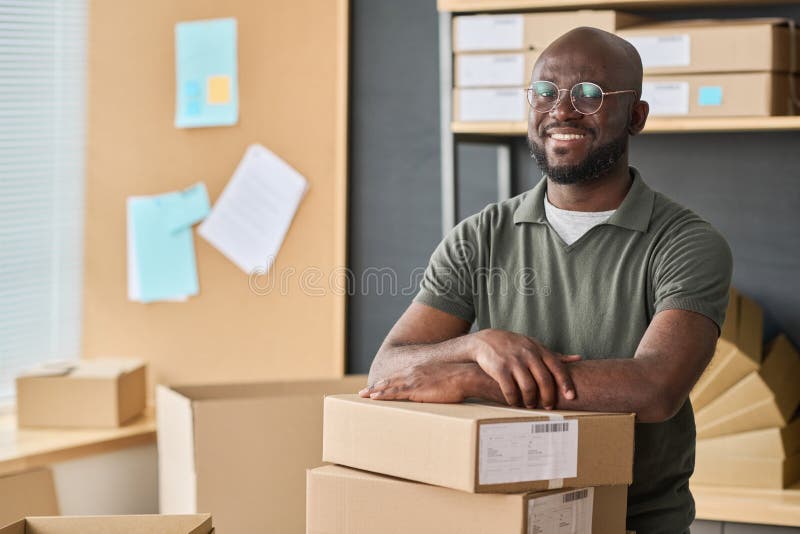 Man with Parcels Working in Warehouse Stock Image - Image of warehouse ...