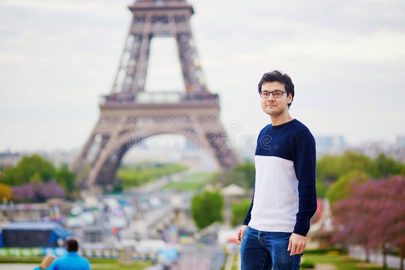 Man in Paris in Front of the Eiffel Tower Stock Image - Image of ...