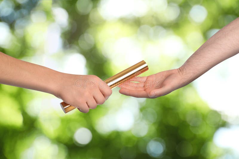 Man Passing Relay Baton To Teammate Outdoors, Closeup Stock Image ...