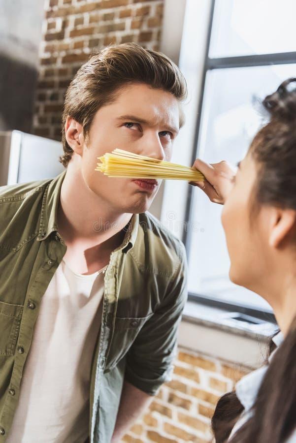 Man with pasta as mustache stock image. Image of food - 93416905