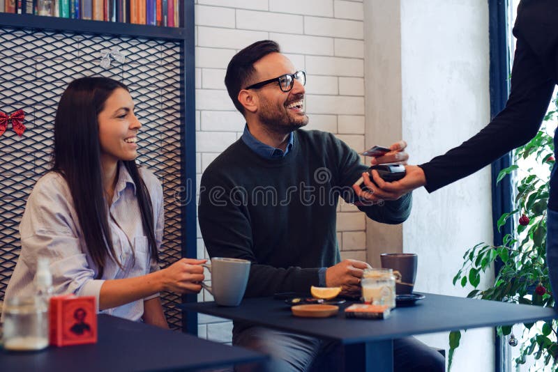 Man Paying Bill at Fancy Restaurant Stock Image - Image of credit ...
