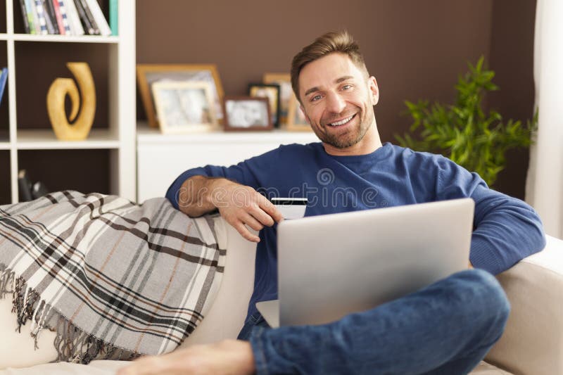 Man paying bills at home stock photo. Image of credit - 40672348