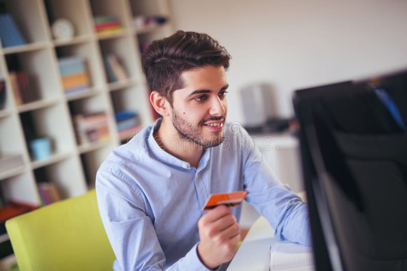 Man Paying with Credit Card on Computer Stock Image - Image of indoors ...