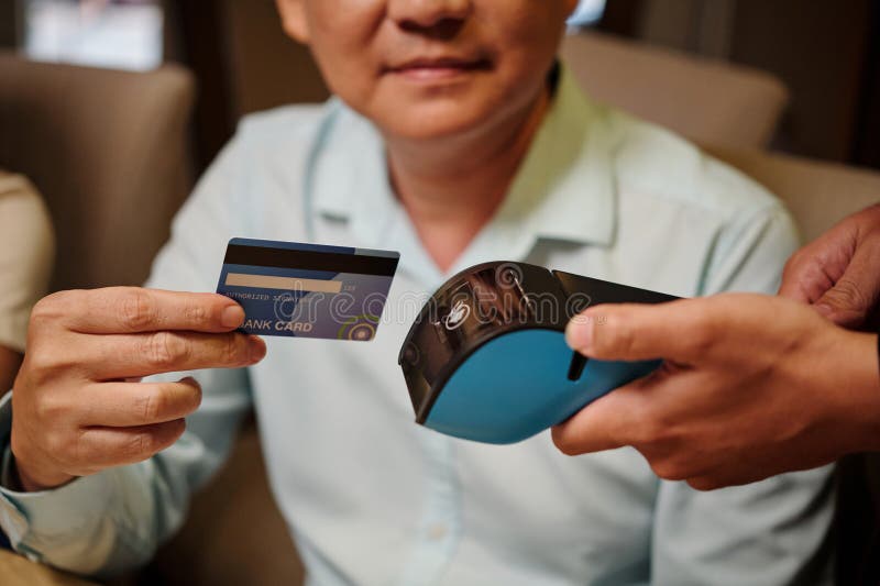 Man Paying with Credit Card in the Restaurant Stock Image - Image of ...
