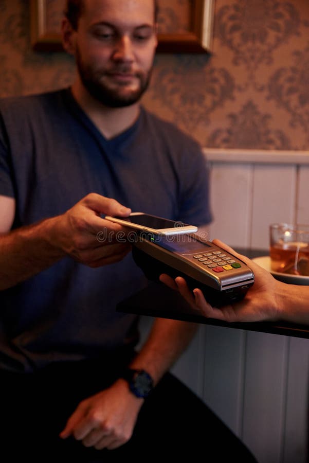 Man Paying His Bill By Machine Stock Photo - Image of payment, happy ...