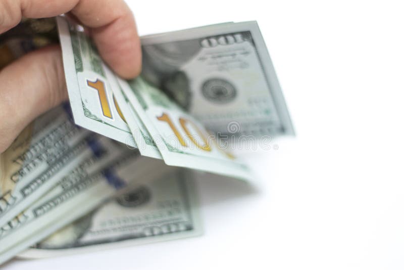 Man Paying by Stack of Paper Dollars Usa on the White Background Stock ...