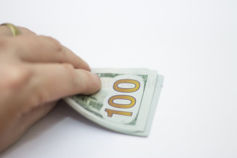 Man Paying by Stack of Paper Dollars Usa on the White Background Stock ...