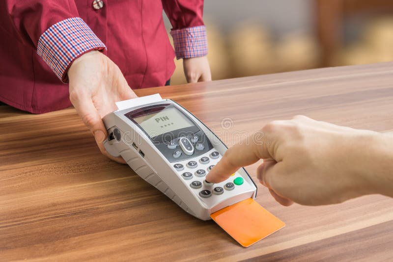 Paying Using Credit Card Terminal in Shoe Store Stock Photo - Image of ...