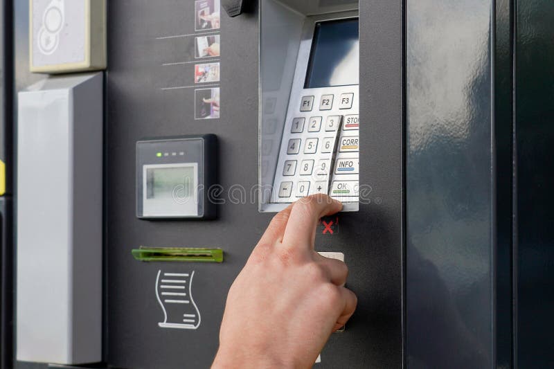 A Man Pays for Fuel at a Terminal at a Gas Station Stock Image - Image ...