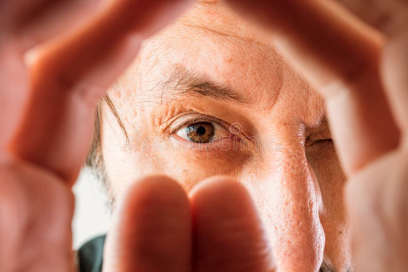Man Peeking through Cupped Hands Stock Photo - Image of human ...