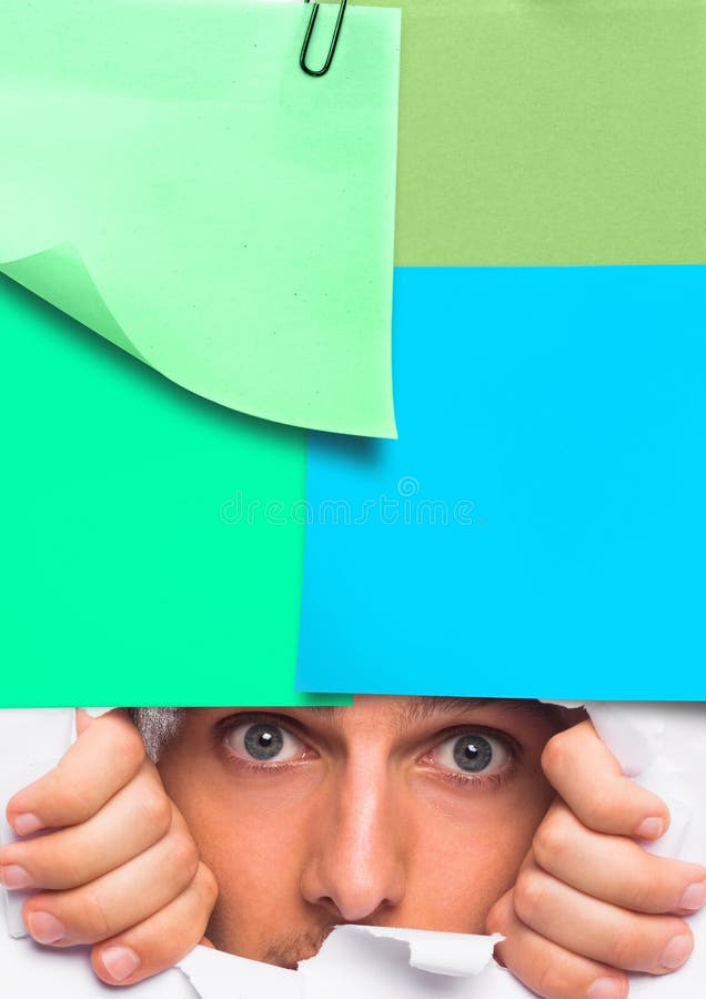 Man Peeking through Ripped Paper Hole Stock Photo - Image of message ...