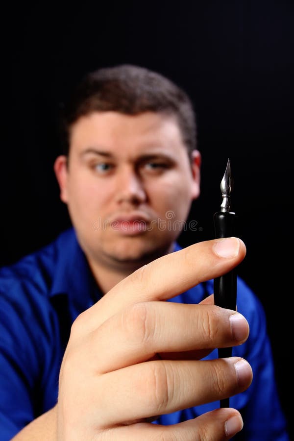 Man with Pen Right stock image. Image of blue, black - 12513155