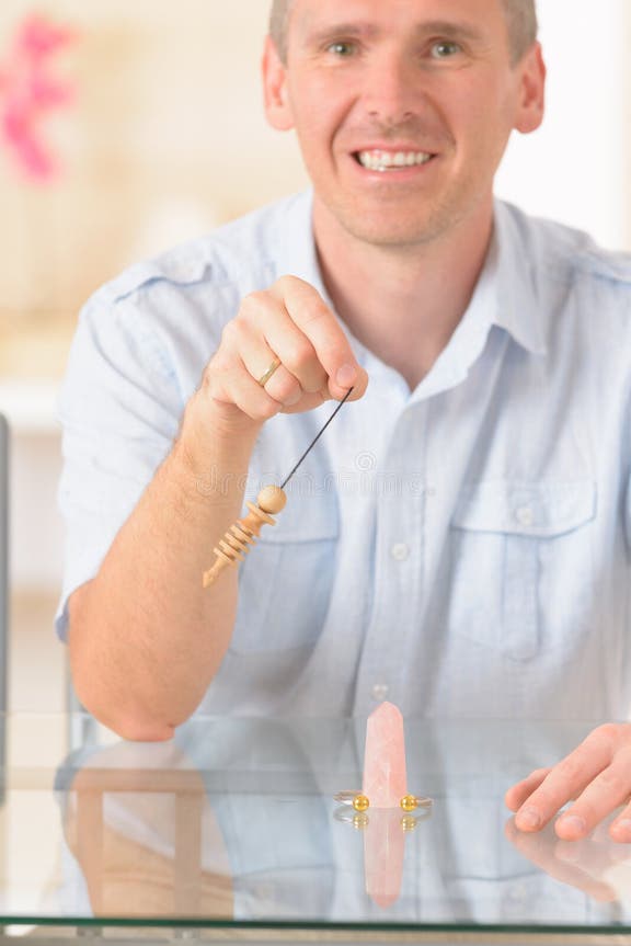 Man with pendulum stock photo. Image of future, dowser - 41619232