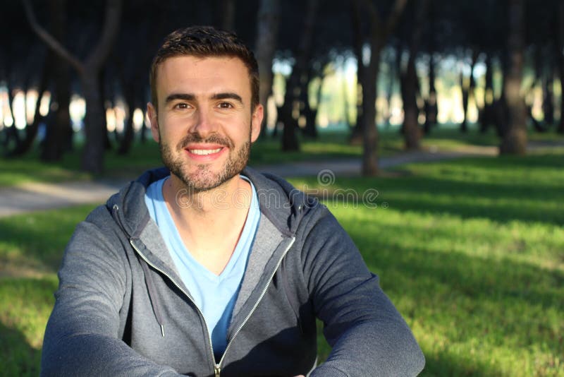 Man with a Perfect Smile Outside in the Park Stock Image - Image of ...