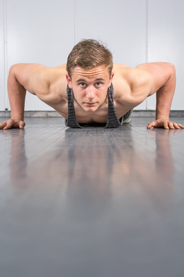 Man Performing Push Ups at the Gym Stock Photo - Image of bodybuilder ...