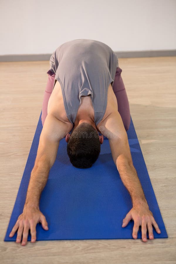 Man performing yoga stock photo. Image of routine, exercising - 78652488