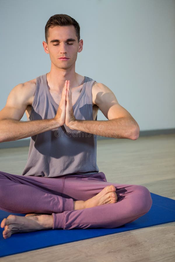 Man in yoga corpse pose stock photo. Image of floor, exercising - 78652558