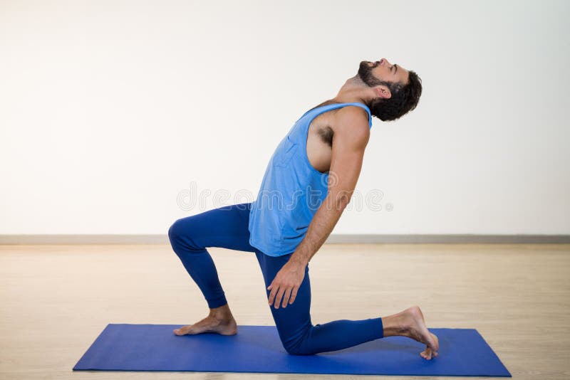 Man performing yoga stock photo. Image of fitness, mixedrace - 78652904