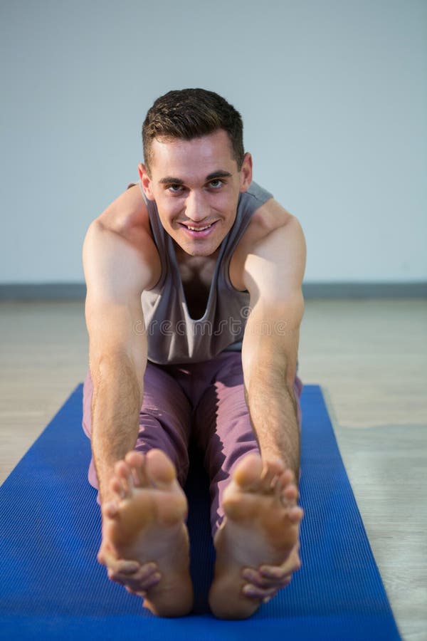 Man in yoga corpse pose stock photo. Image of floor, exercising - 78652558