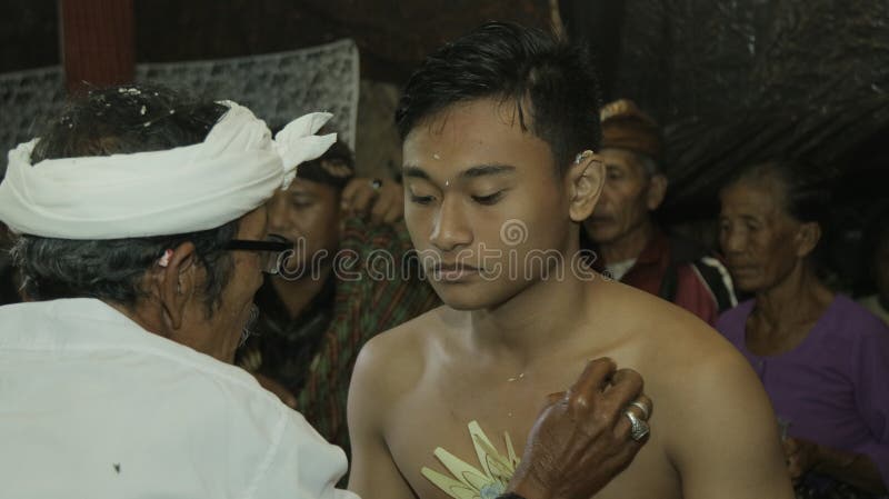 A Man Performs a Ritual in a Traditional Balinese Event Editorial Stock ...
