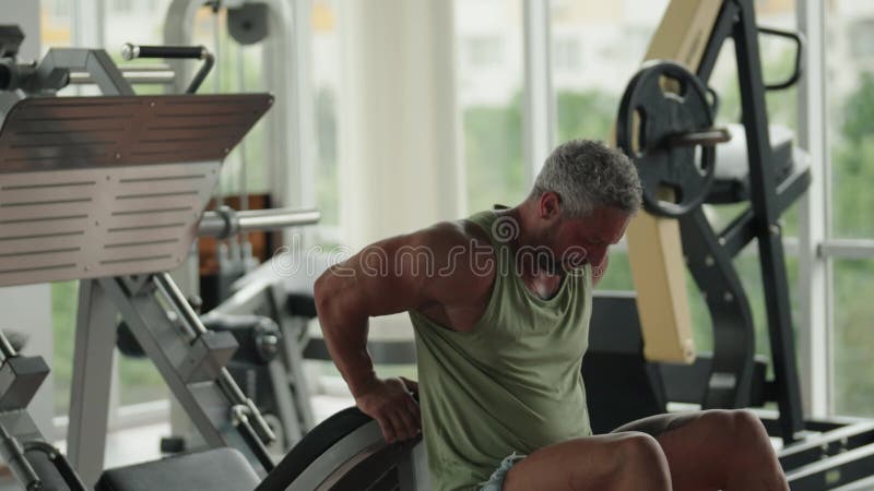 Man Doing Tricep Dips in a Modern Gym Stock Footage - Video of ...