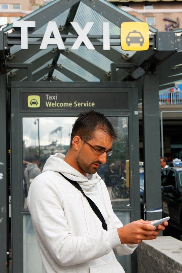 Man Person Orders a Taxi from His Cell Phone Stock Image - Image of ...