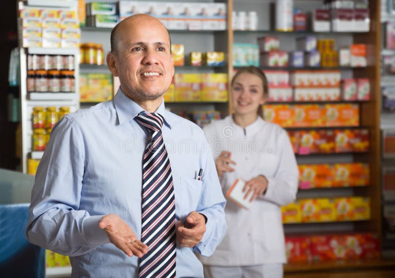 Man Pharmacist in Apothecary Stock Image - Image of employee, medical ...