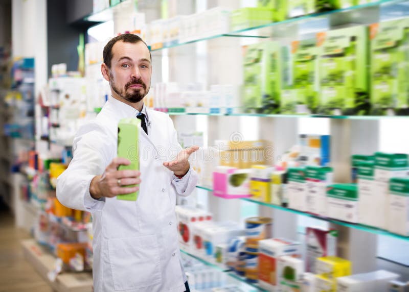 Man Pharmacist Showing Assortment Stock Image - Image of caucasian ...
