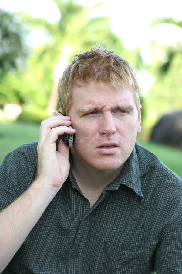 Man on the Phone with a Angry or Confused Expression Stock Photo ...