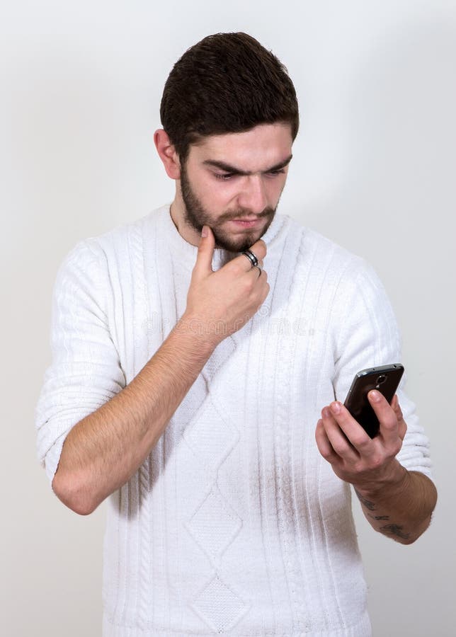 Man with phone stock photo. Image of sweater, casual - 62099154