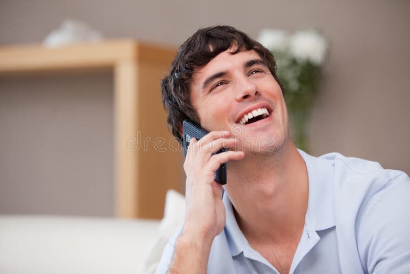 Man on the phone laughing stock photo. Image of relaxed - 22361118