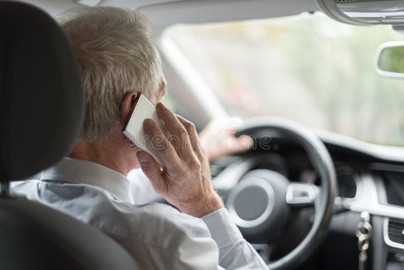 Man phoning and driving stock image. Image of road, hand - 79671211