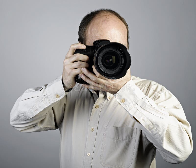 A man with photo camera stock image. Image of elegant - 25546285
