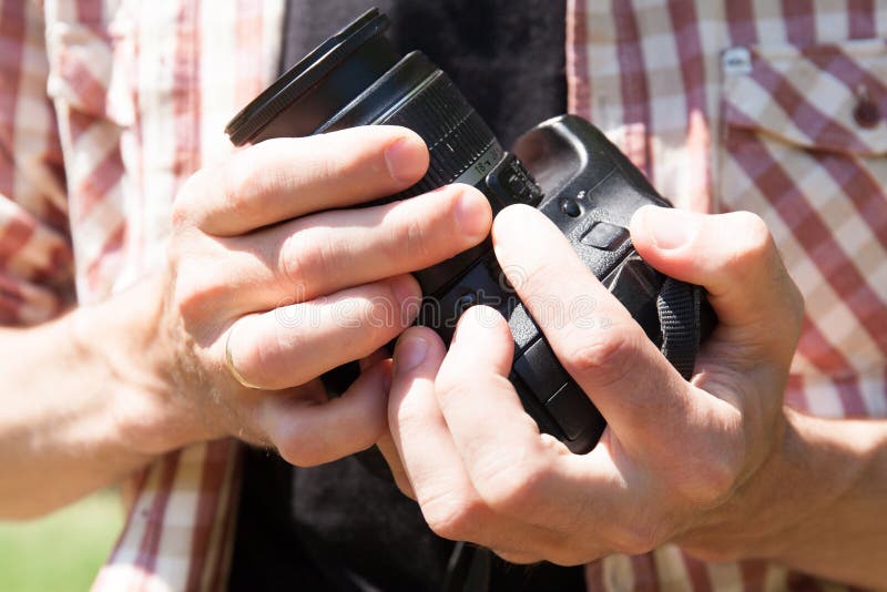 Man Photograph with Camera in Hand Stock Image - Image of digital ...