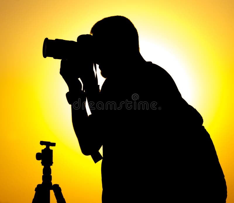 Man Photographer with a Camera at Sunset Stock Image - Image of male ...