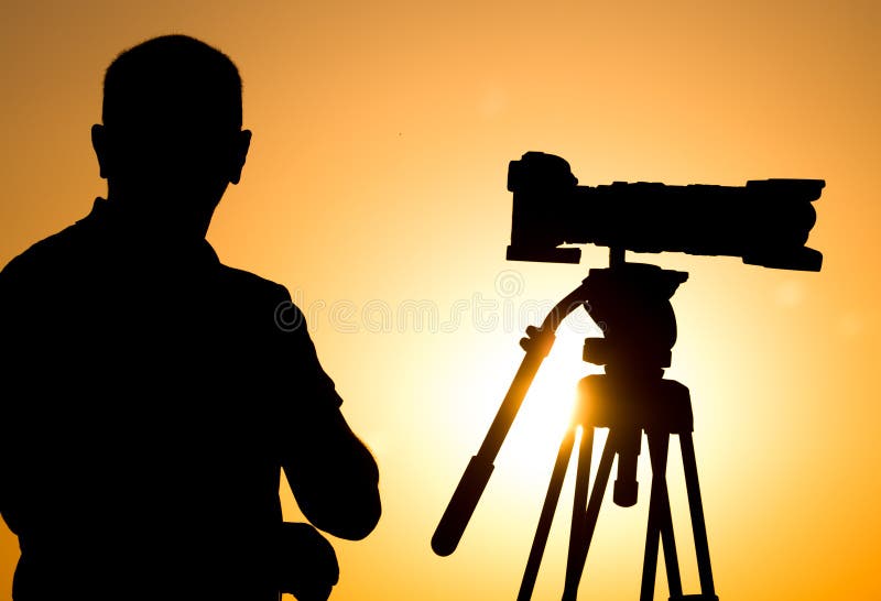 Man Photographer with a Camera at Sunset Stock Image - Image of work ...
