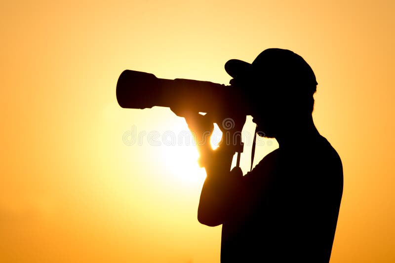 Man Photographer with a Camera at Sunset Stock Image - Image of sunset ...